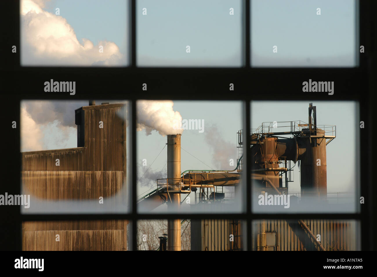 Industrial facility viewed through windows Stock Photo - Alamy