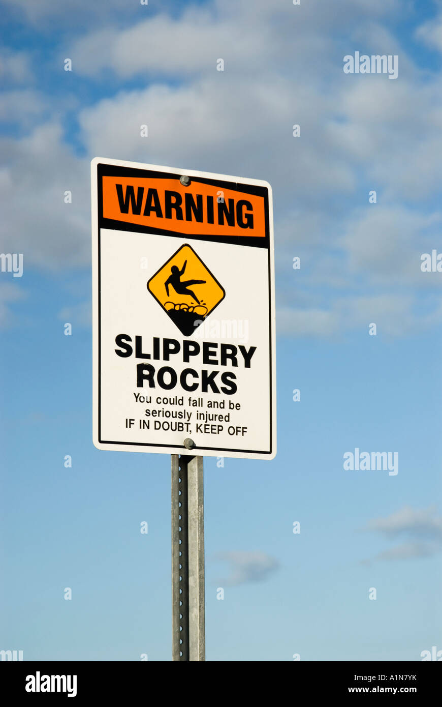 Slippery rocks warning sign beach hi-res stock photography and images ...