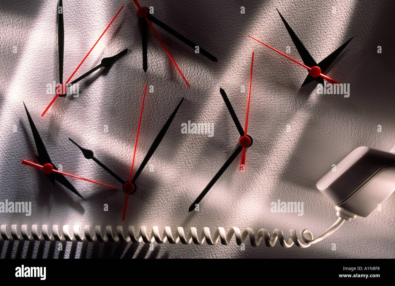 Time clocks and telephone Stock Photo - Alamy