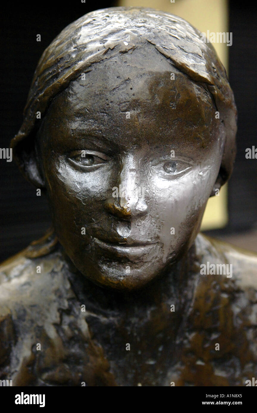 sculpture statue modern female face vandalised spraypaint white damaged ...