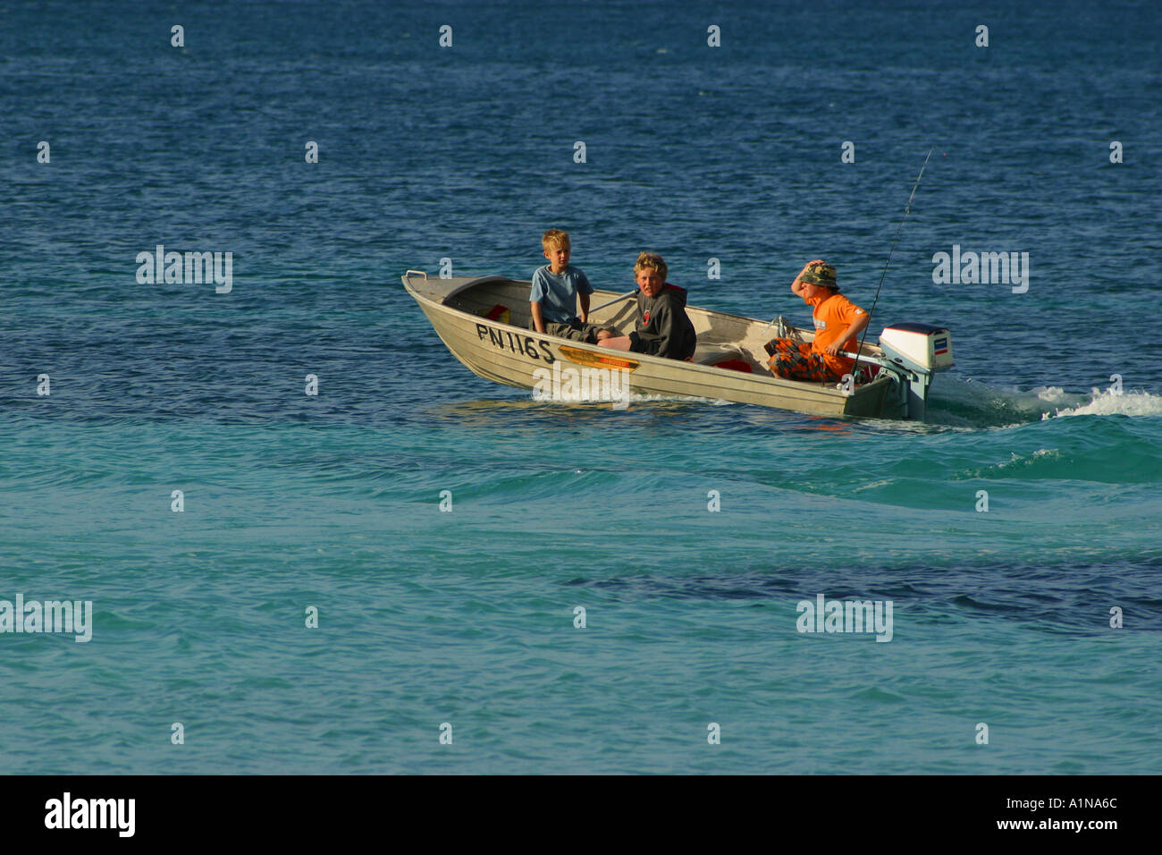 fishing in a dinghy Stock Photo - Alamy