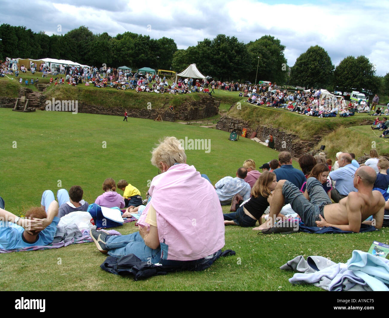 People watching a Roman event at the amphitheatre in Caerleon South ...