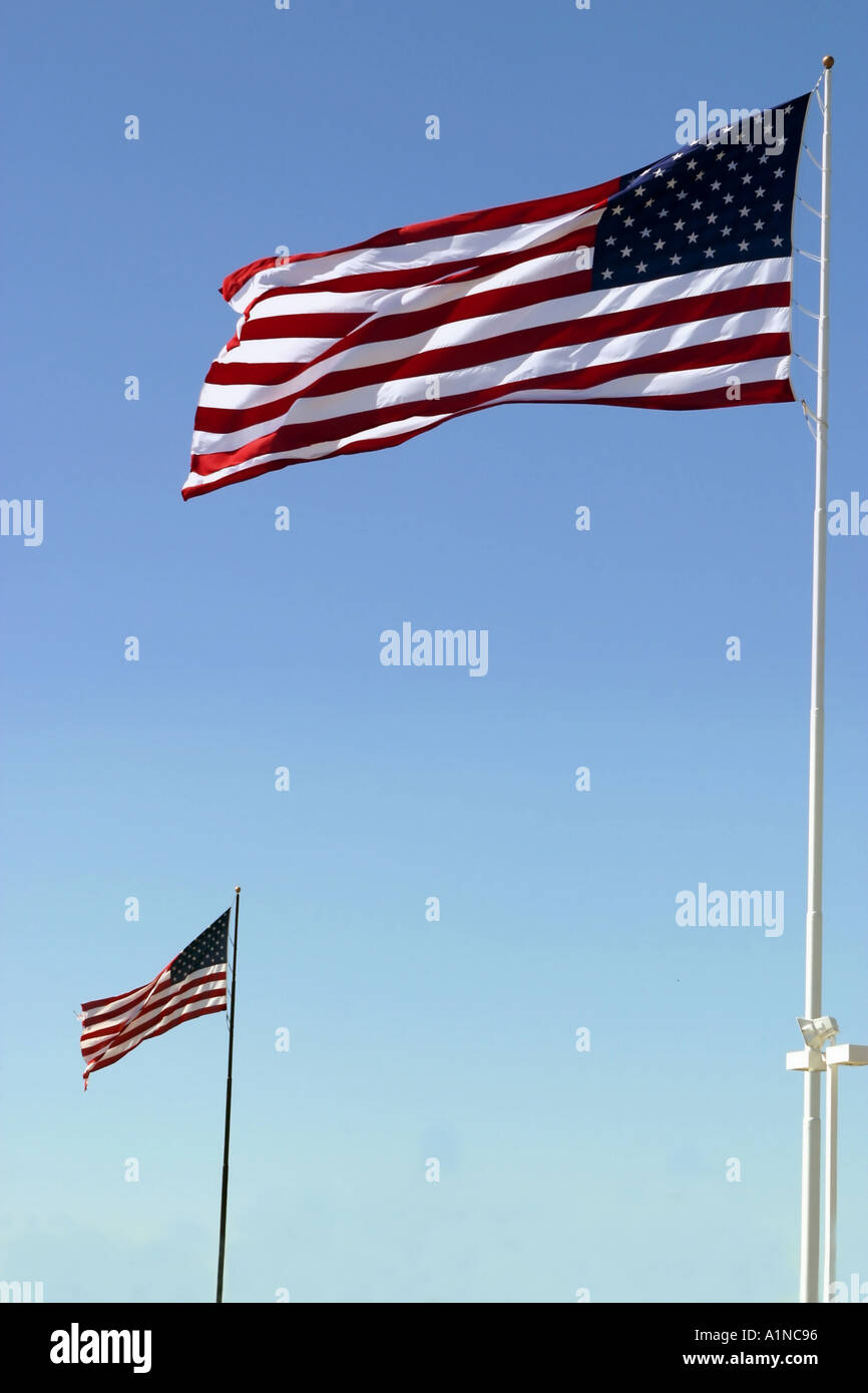 Two American Flags Near and Far On Flag Poles Stock Photo - Alamy