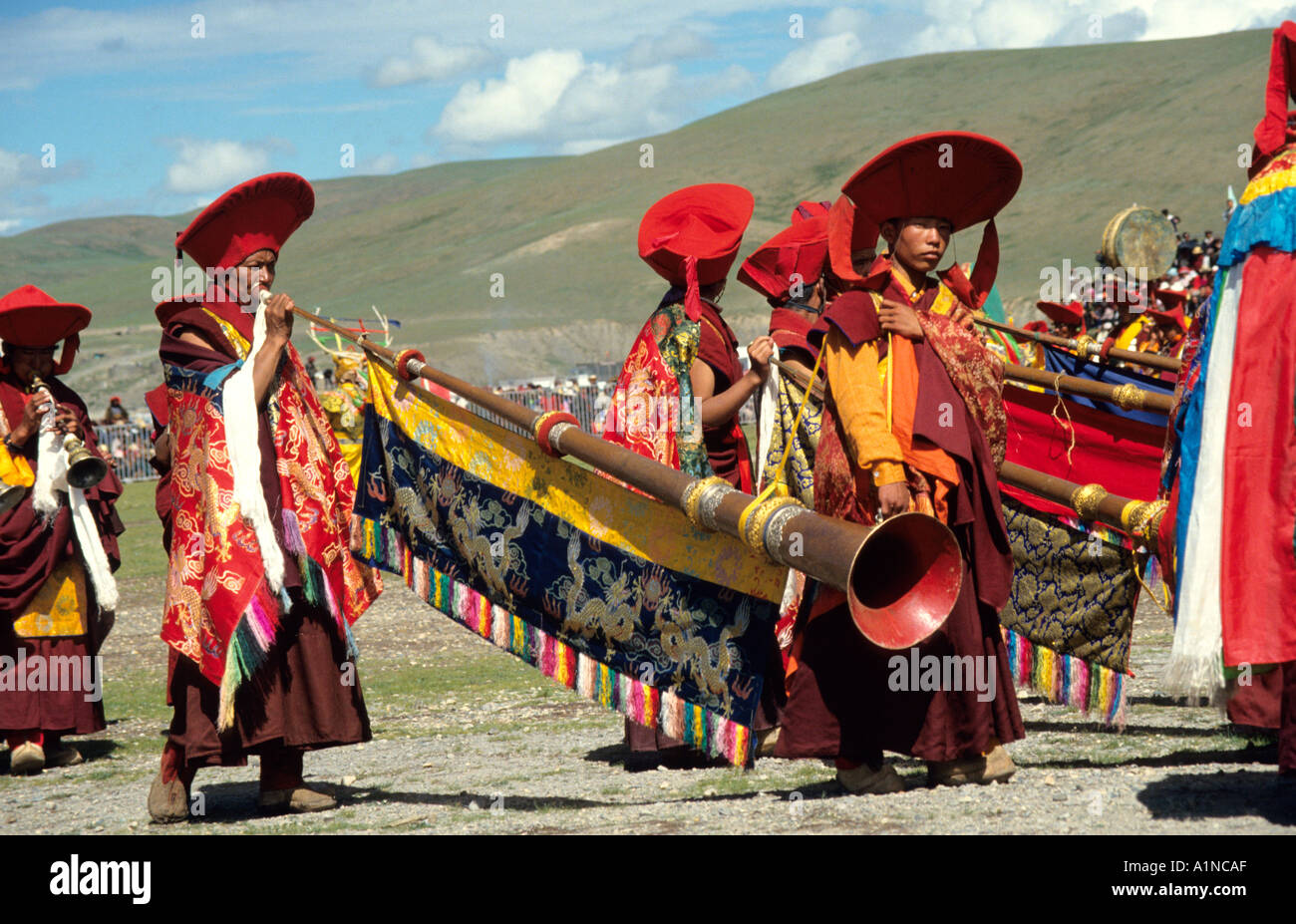 monks of the ancient Bon religion play a traditional role as they ...