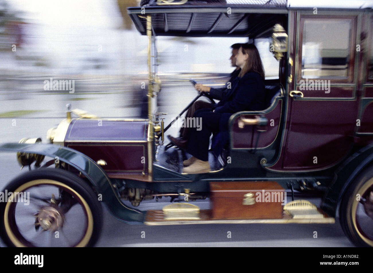 Driving old car Barcelona Stock Photo - Alamy