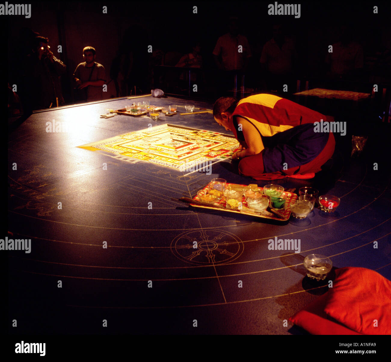Buddhism monk making mandala Stock Photo - Alamy