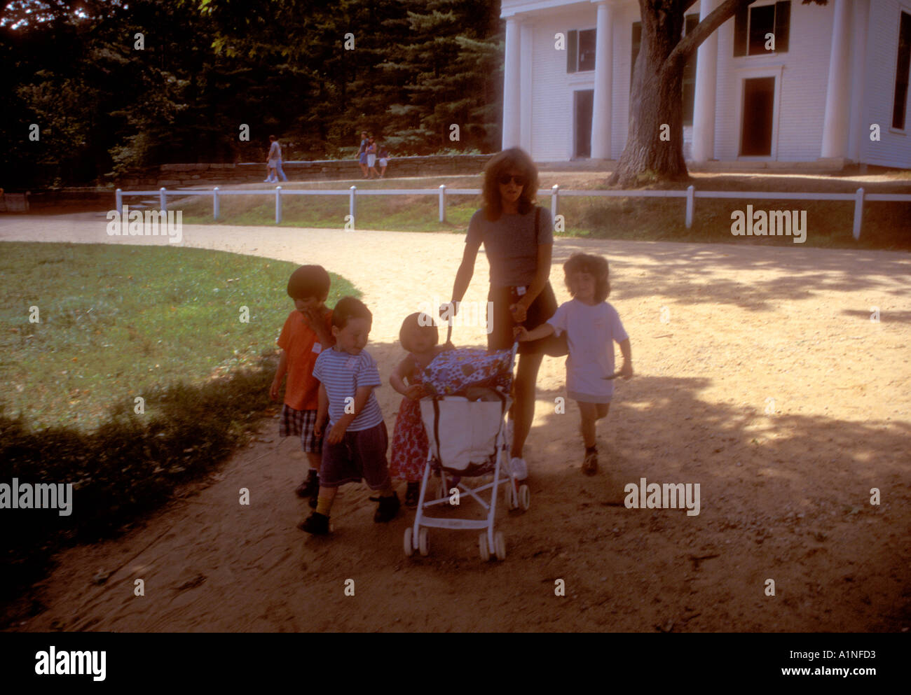 Mother and young family of 4 children visiting Old Sturbridge Village ...