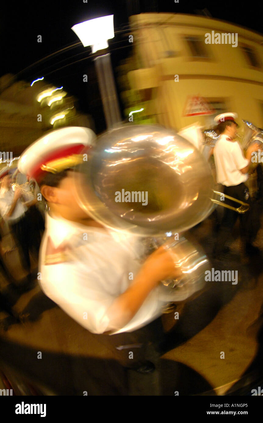 brass band musicians street perform play night street scene family ...