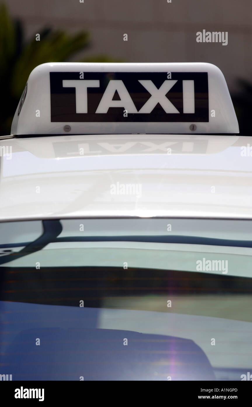 taxi white car motor transport hire cab colour color vertical outside ...