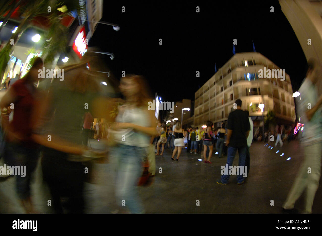 night street scene family people pedestrians promenade holiday vacation ...