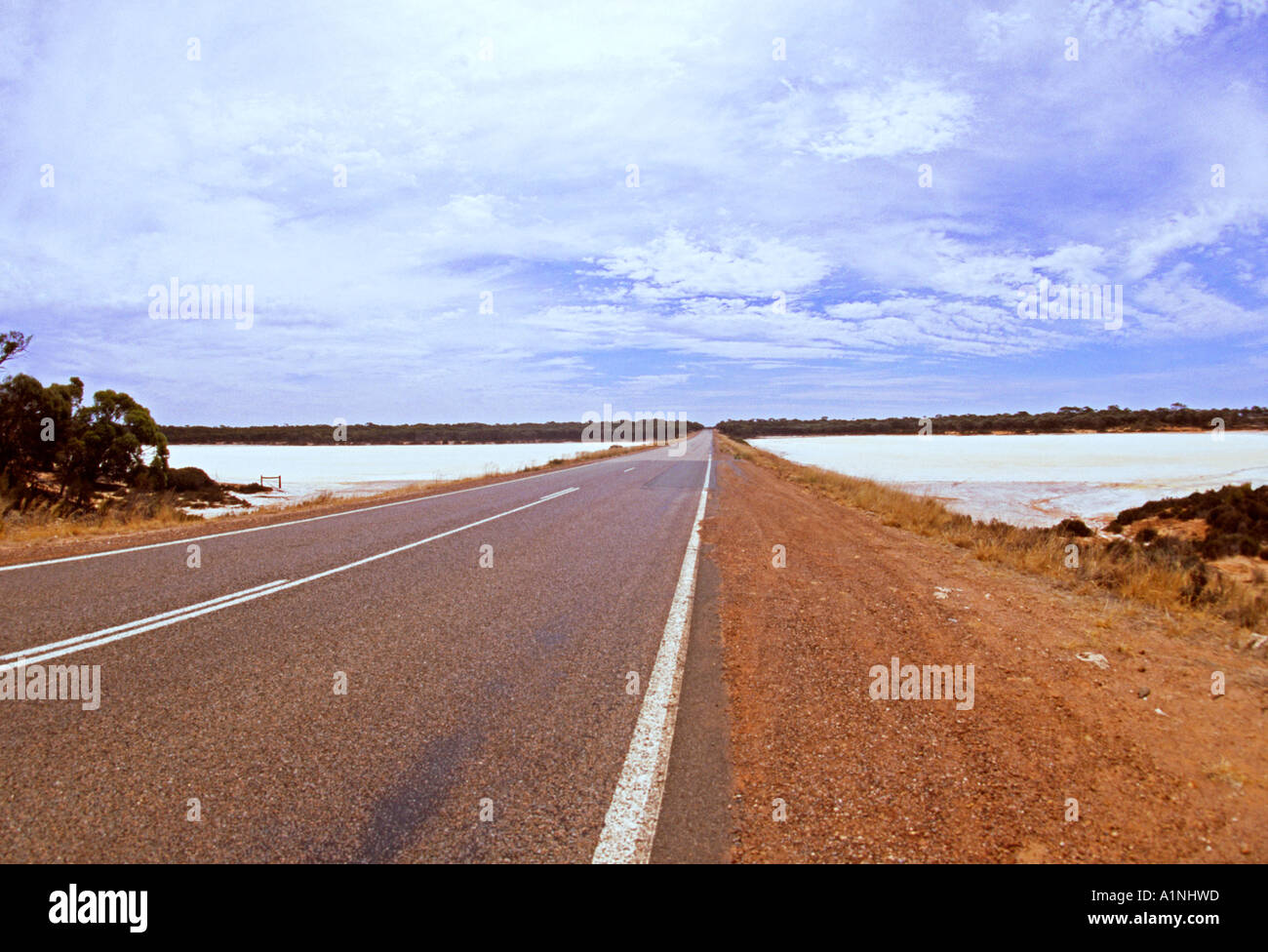 The road over Lake Cowan, a salt lake in Western Australia Stock Photo ...