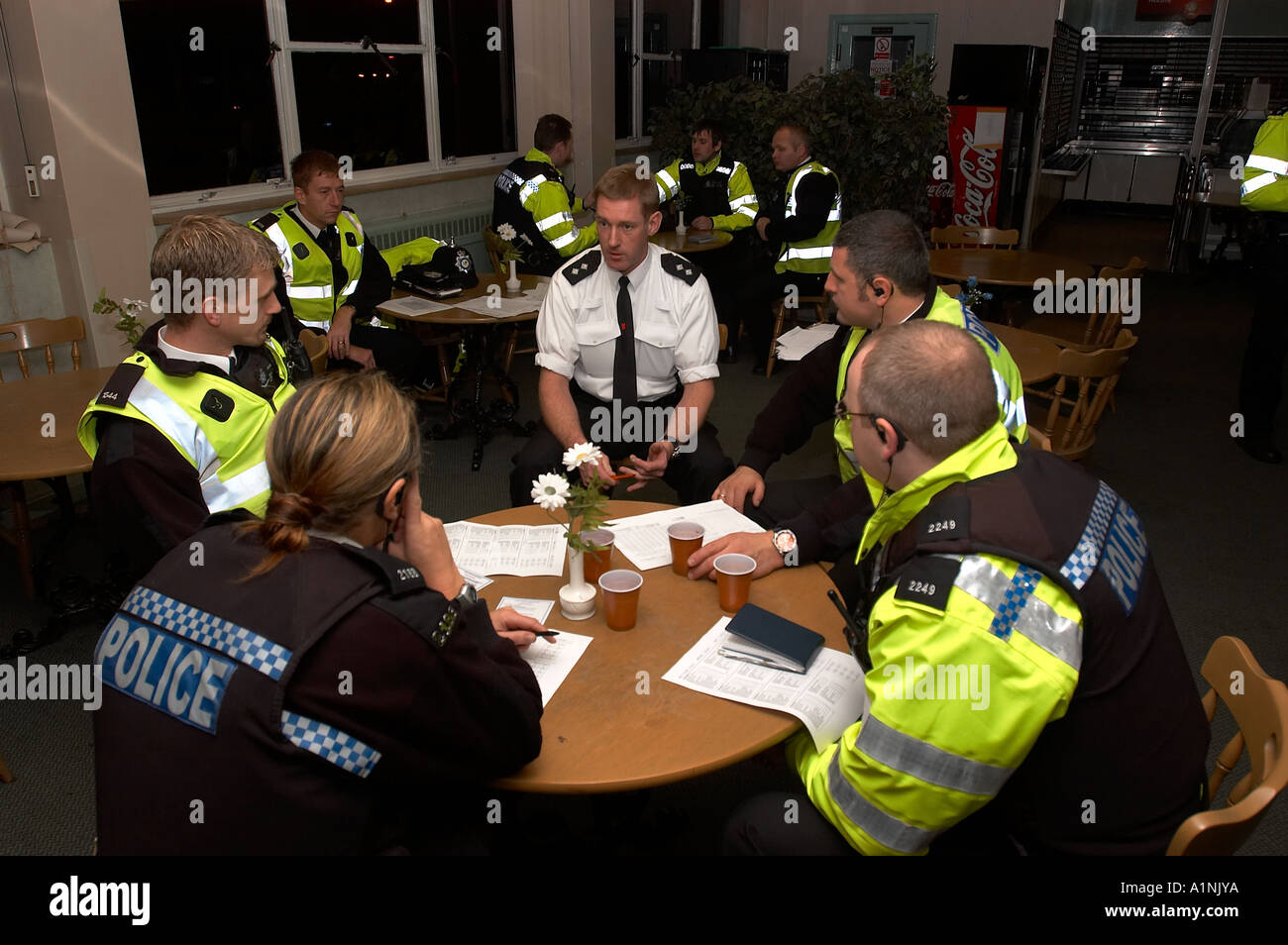 Humberside Police officers in a team briefing before patroling the ...