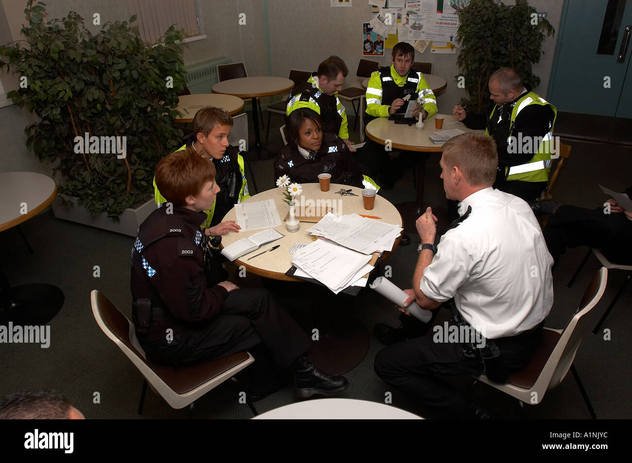 Humberside Police officers in a team briefing before patroling the ...