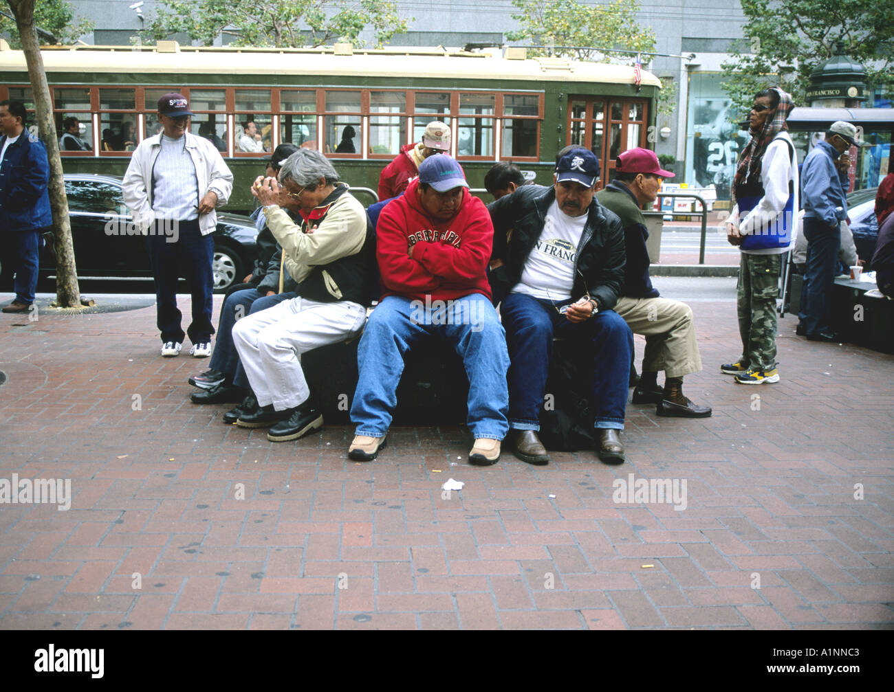 Group men seated hi-res stock photography and images - Alamy