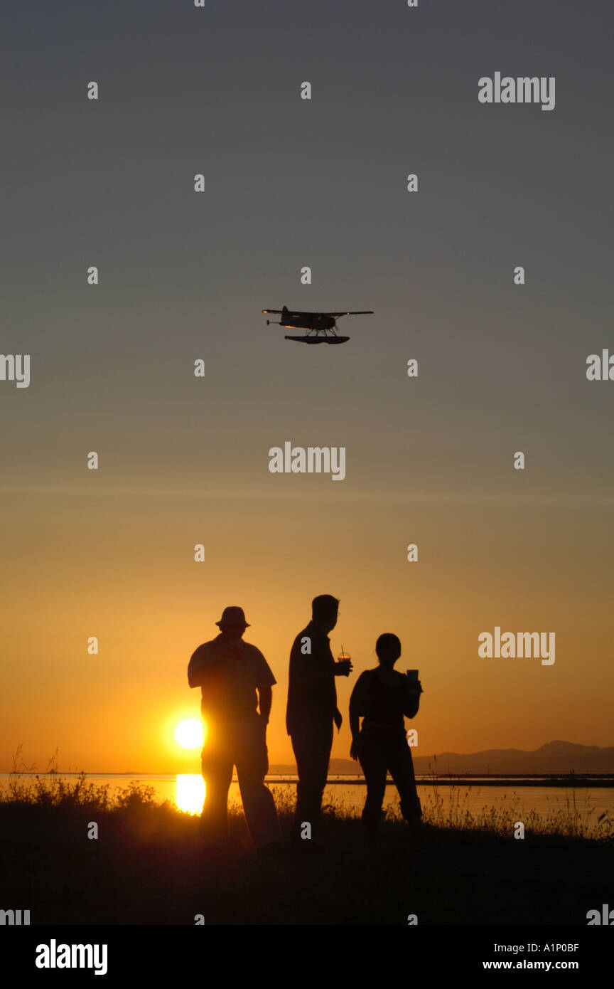 THREE AND A PLANE Stock Photo - Alamy
