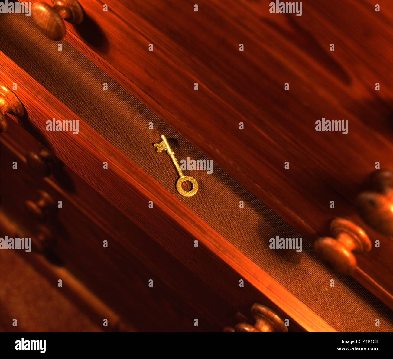 Gold coloured key in an open drawer Stock Photo - Alamy