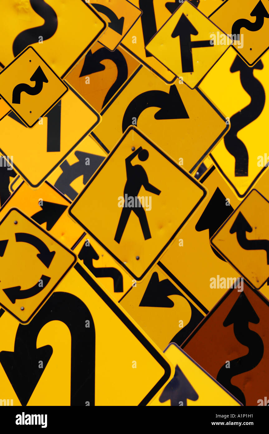 lost in direction with multiple road signs Stock Photo - Alamy