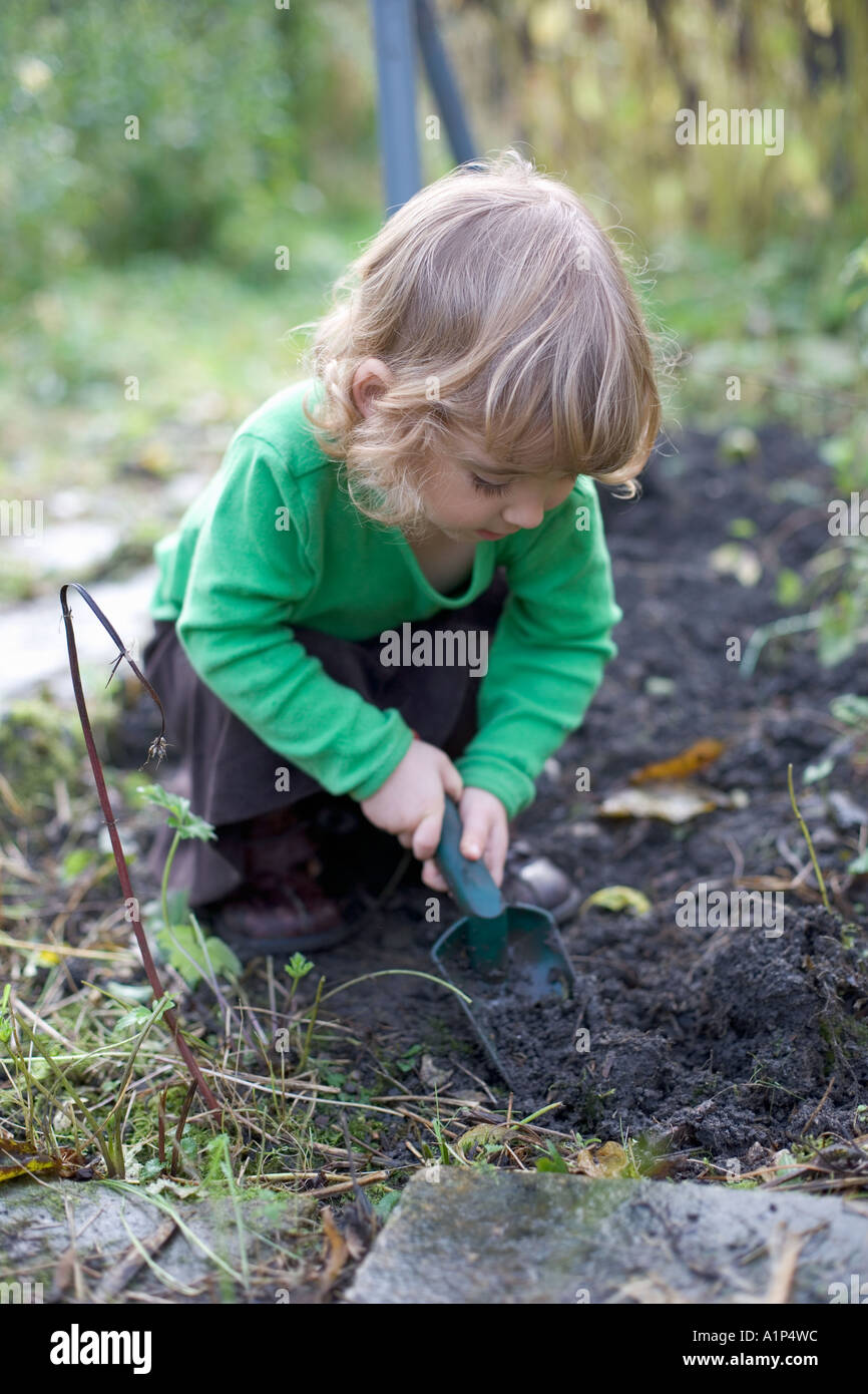 Digging mud child hi-res stock photography and images - Alamy