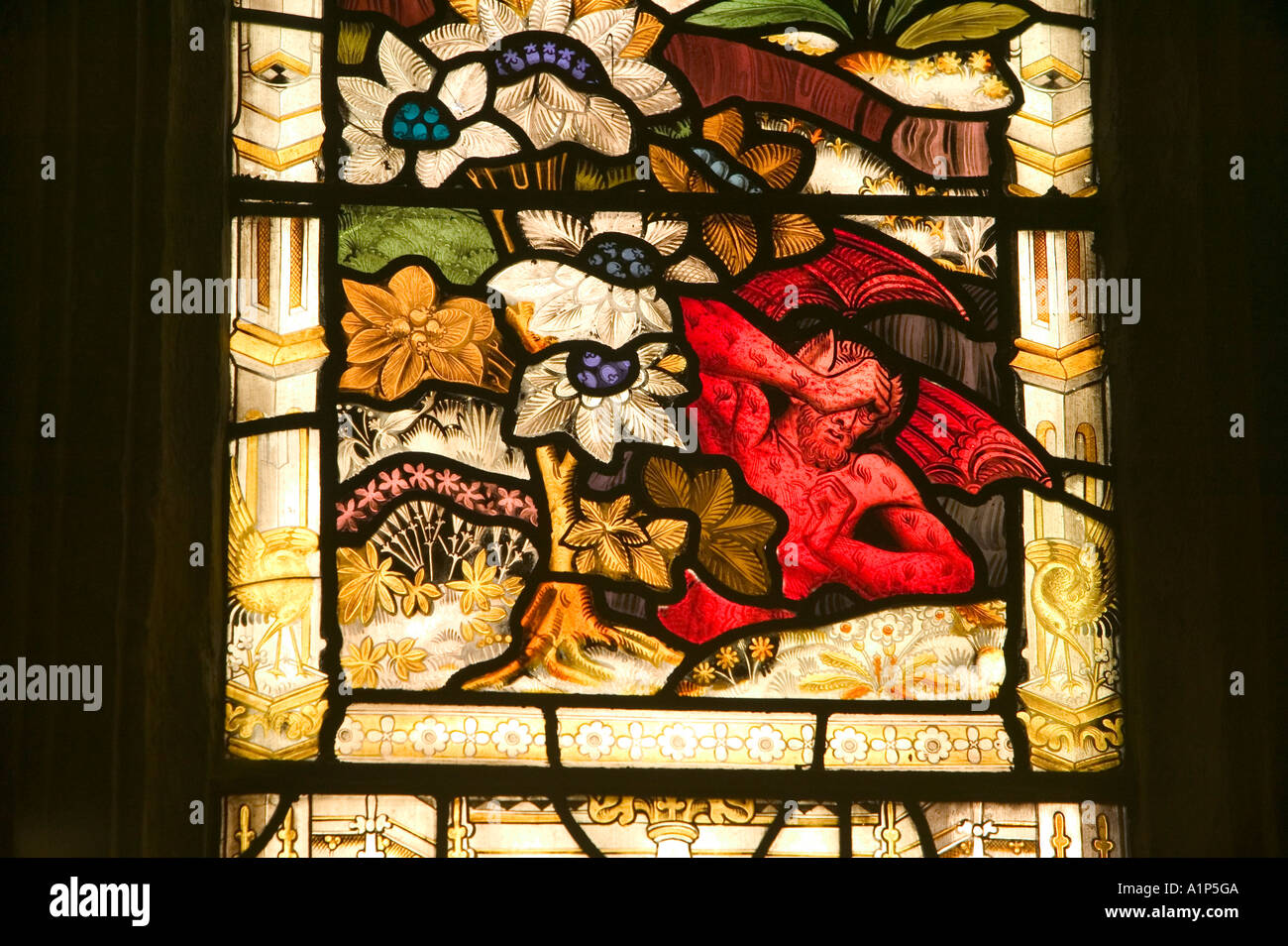the devil in a stained glass window in a Lancaster church, Lancashire ...