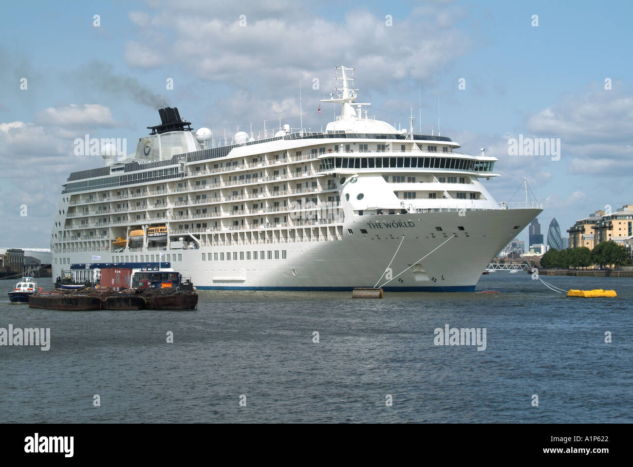 The World floating hotel and cruise ship moored on the River Thames ...
