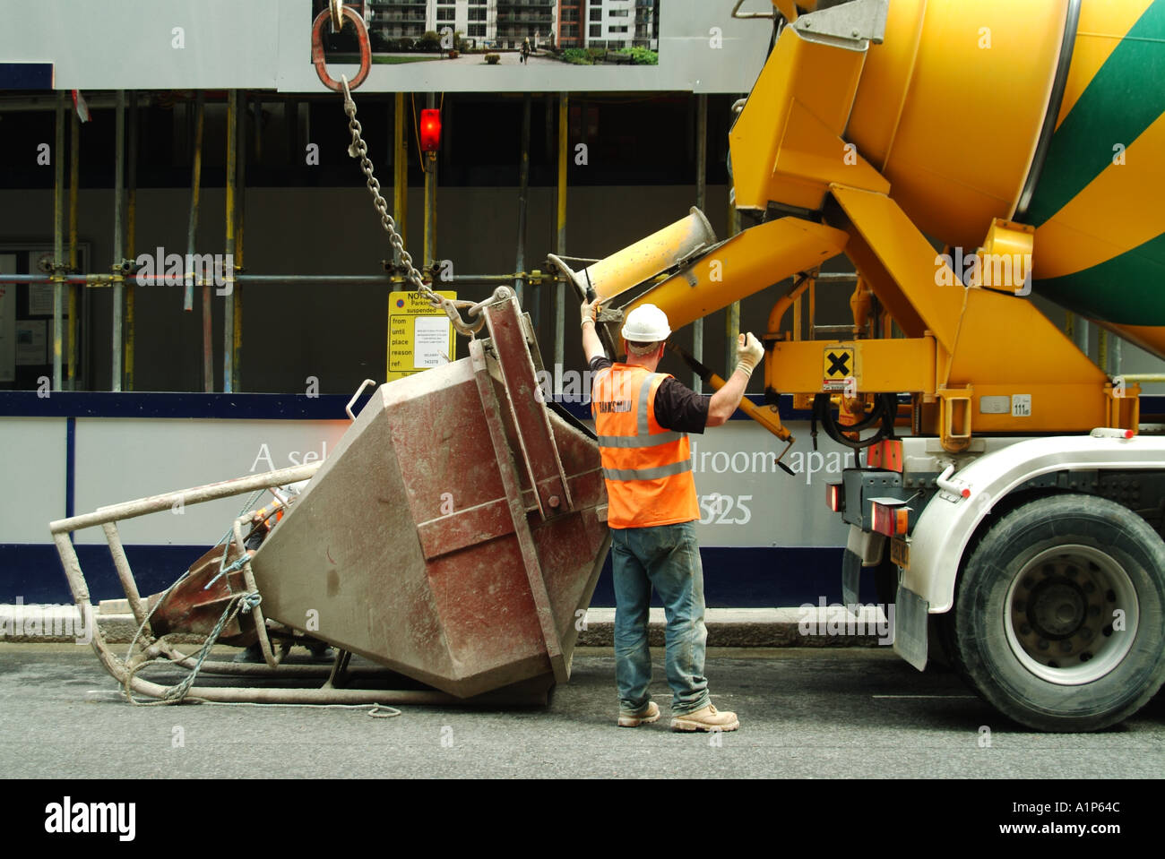 London City of Westminster building site with banksman guiding ...