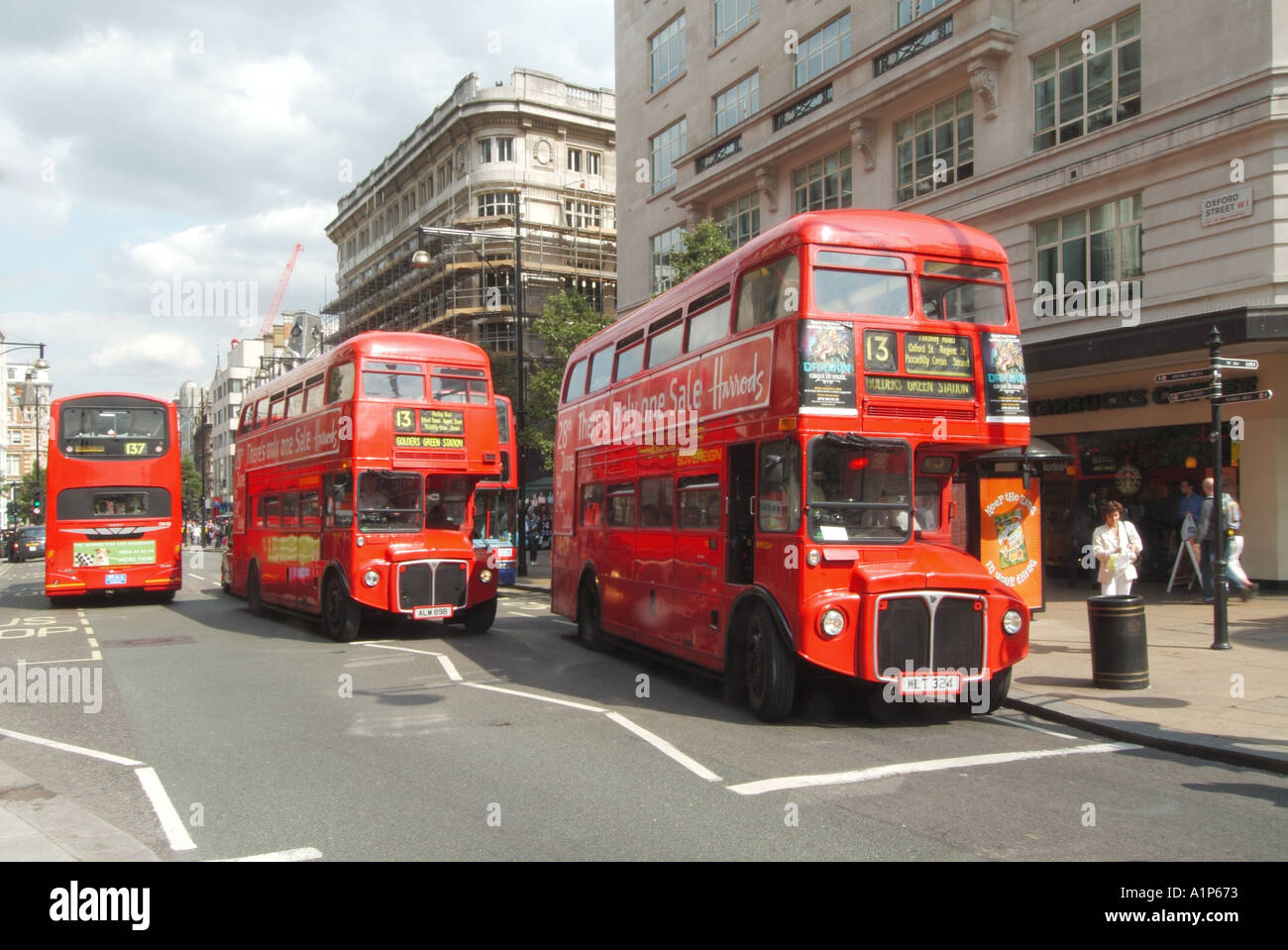 Oxford Street two red public transport routemaster buses same number 13 ...