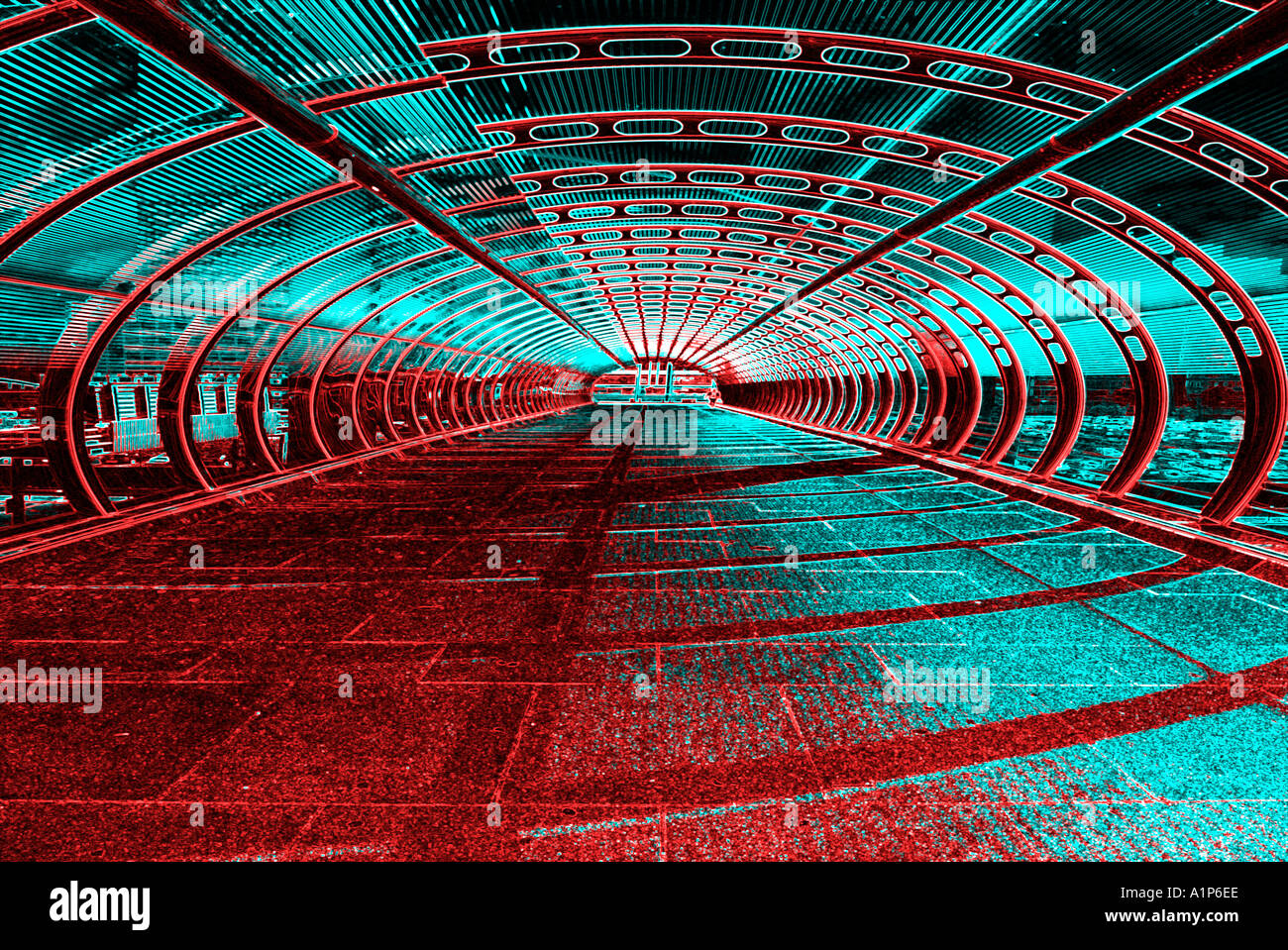 Pedestrian footbridge inside translucent steel framed tubular tunnel ...
