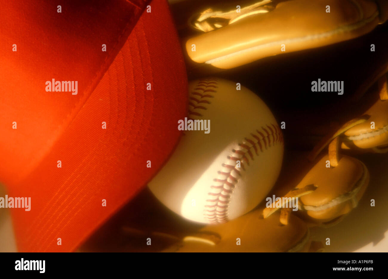Baseball glove cap and ball Stock Photo - Alamy