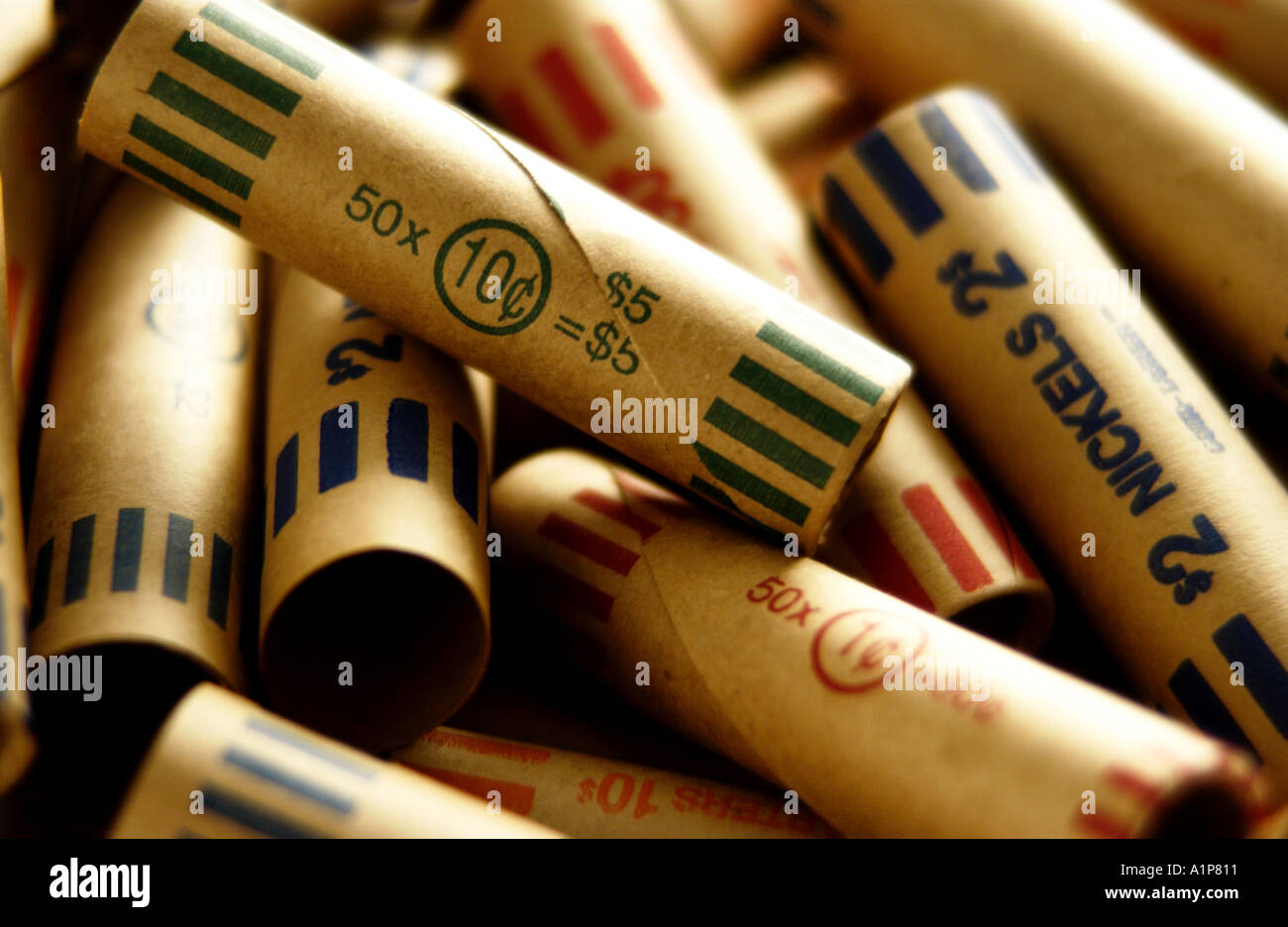 Paper coin rolls hi-res stock photography and images - Alamy