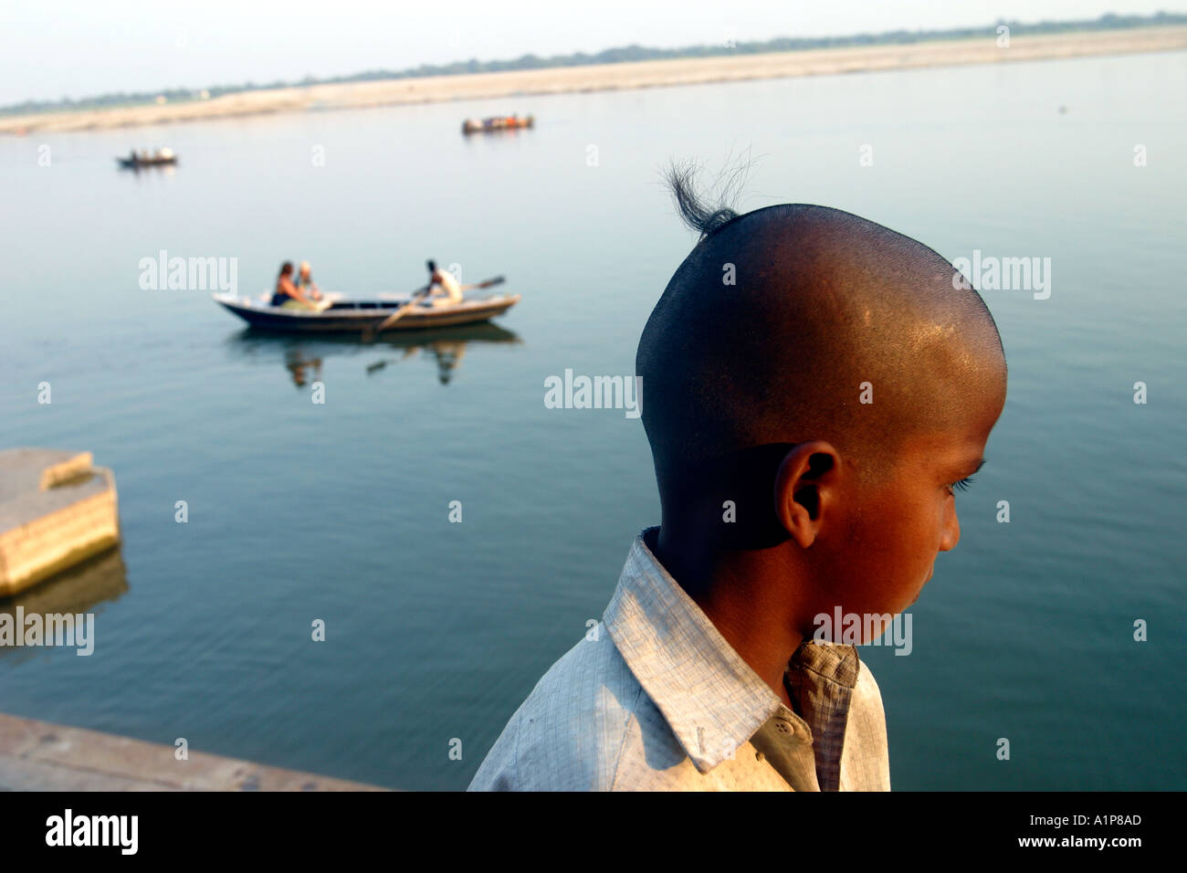 Indian boy in holy river hi-res stock photography and images - Alamy