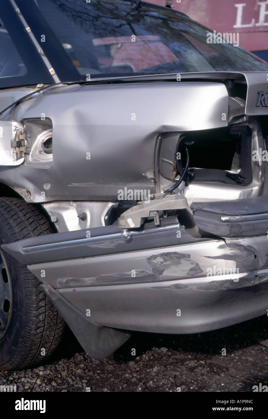 Close up of car crash damage to rear end corner bodywork Essex England ...