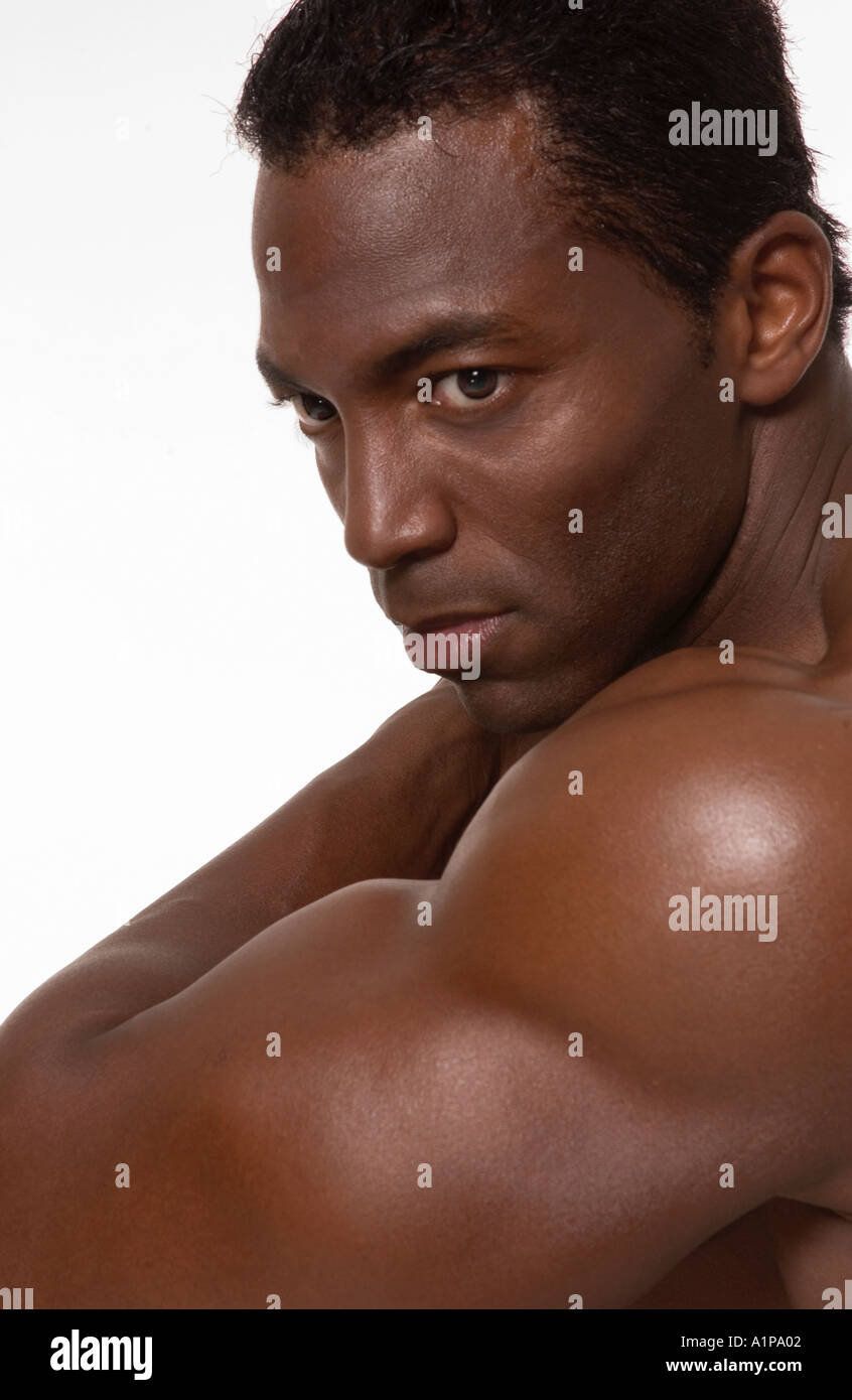 African bodybuilder flexing muscles hi-res stock photography and images ...