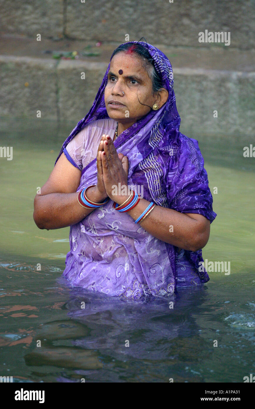 Hindus praying in water hi-res stock photography and images - Alamy