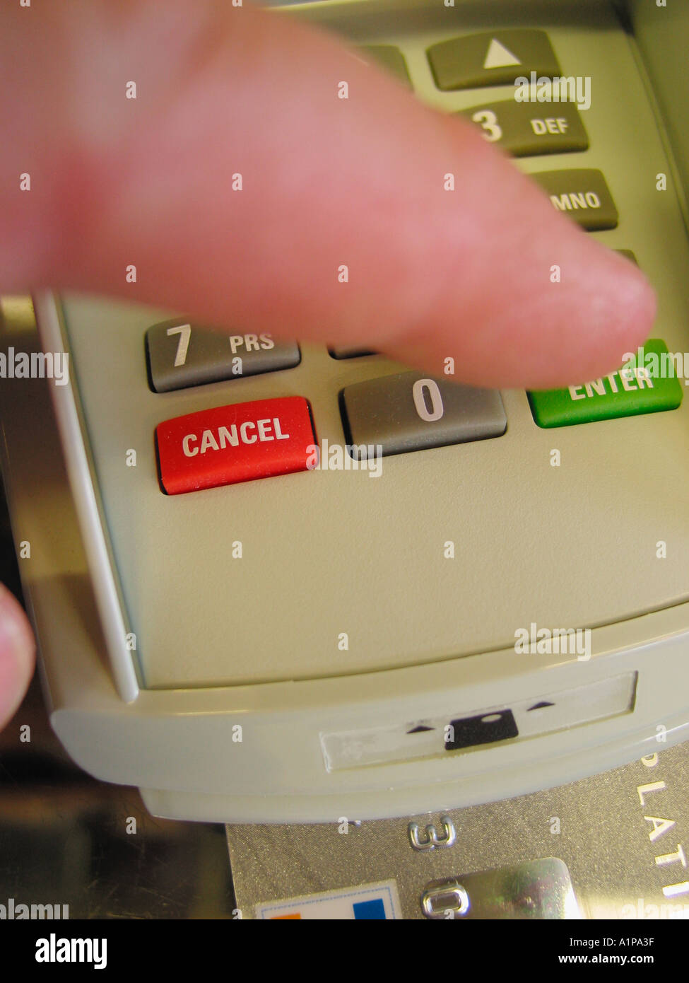 Finger typing in pin number, pressing enter button on a chip and pin ...