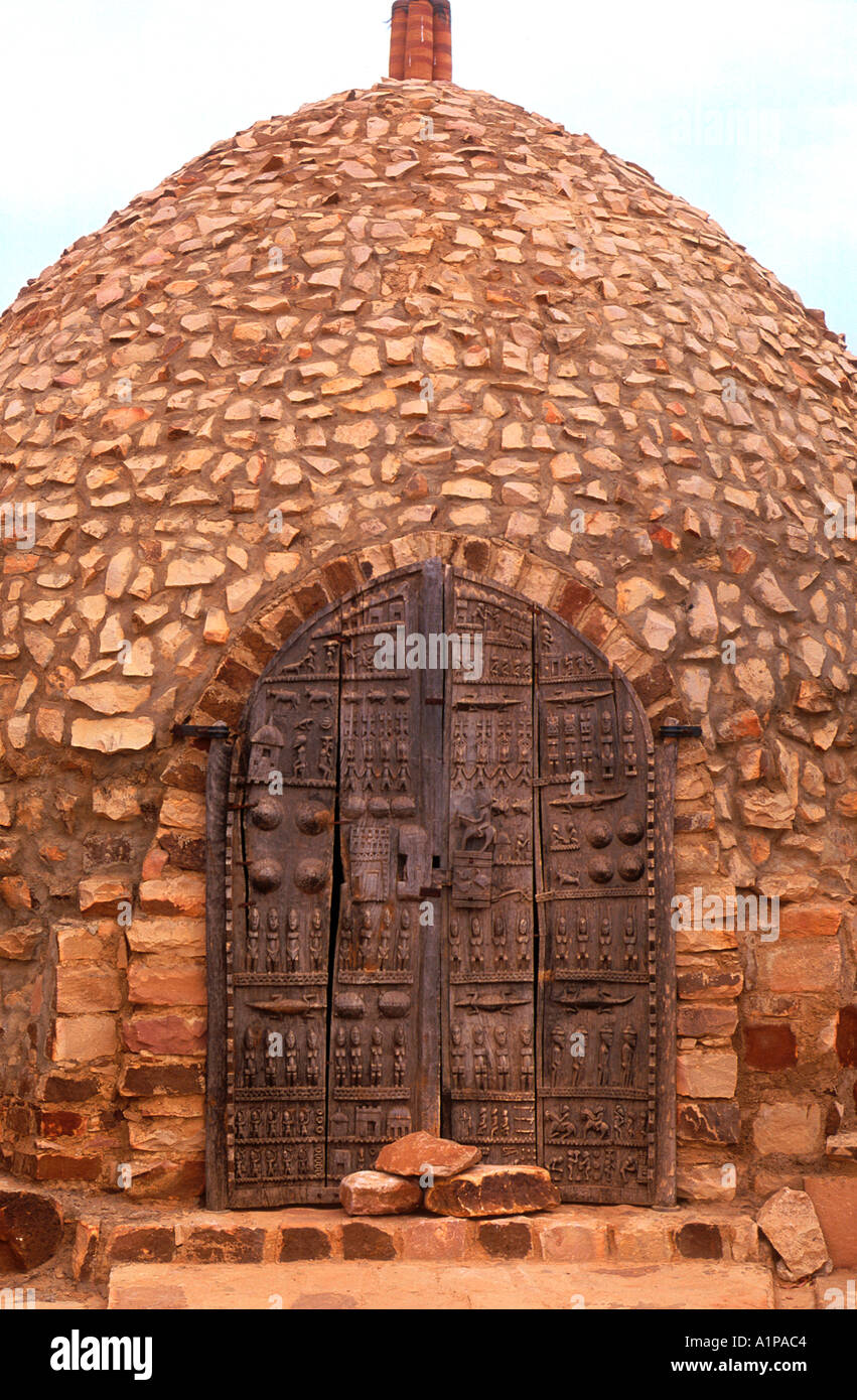 Dogon building with carved doors human figures and animals building ...