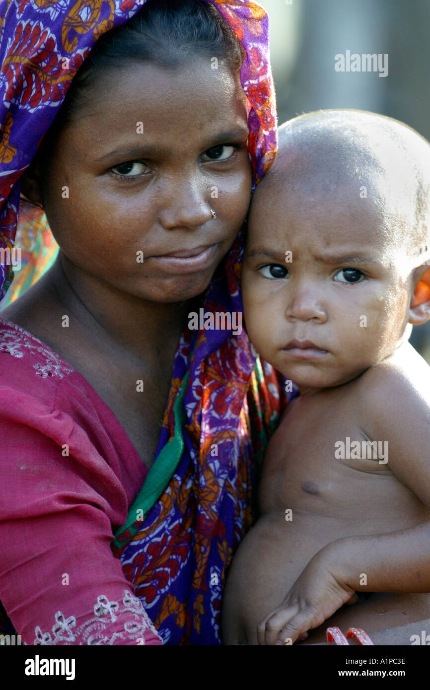 Poor Indian Mother With Baby