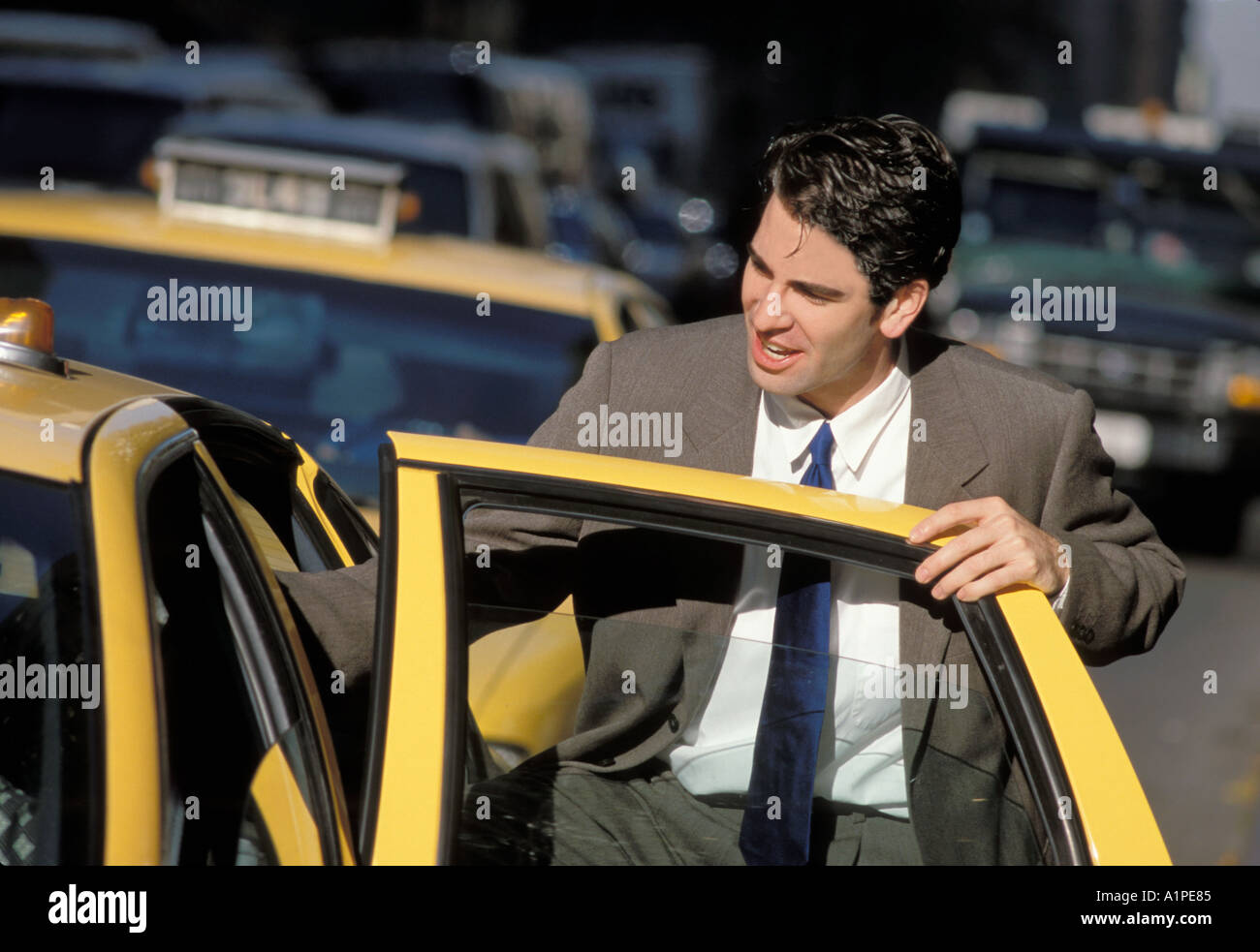 Getting in taxi hi-res stock photography and images - Alamy