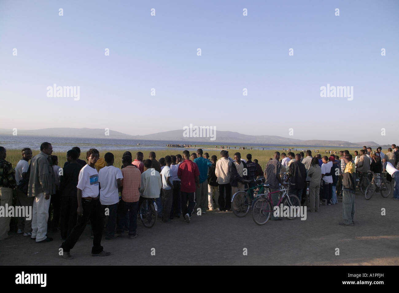 People watching something along Lake Awassa Ethiopia Stock Photo - Alamy
