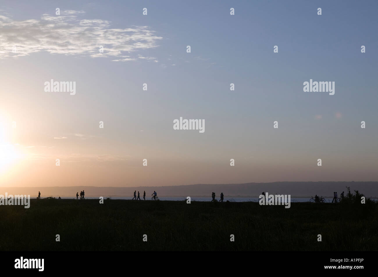 People walk along Lake Awassa in the early evening Ethiopia Stock Photo ...
