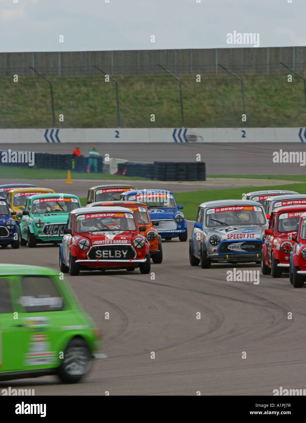 Mini Racing Cars racing around a circuit Stock Photo - Alamy