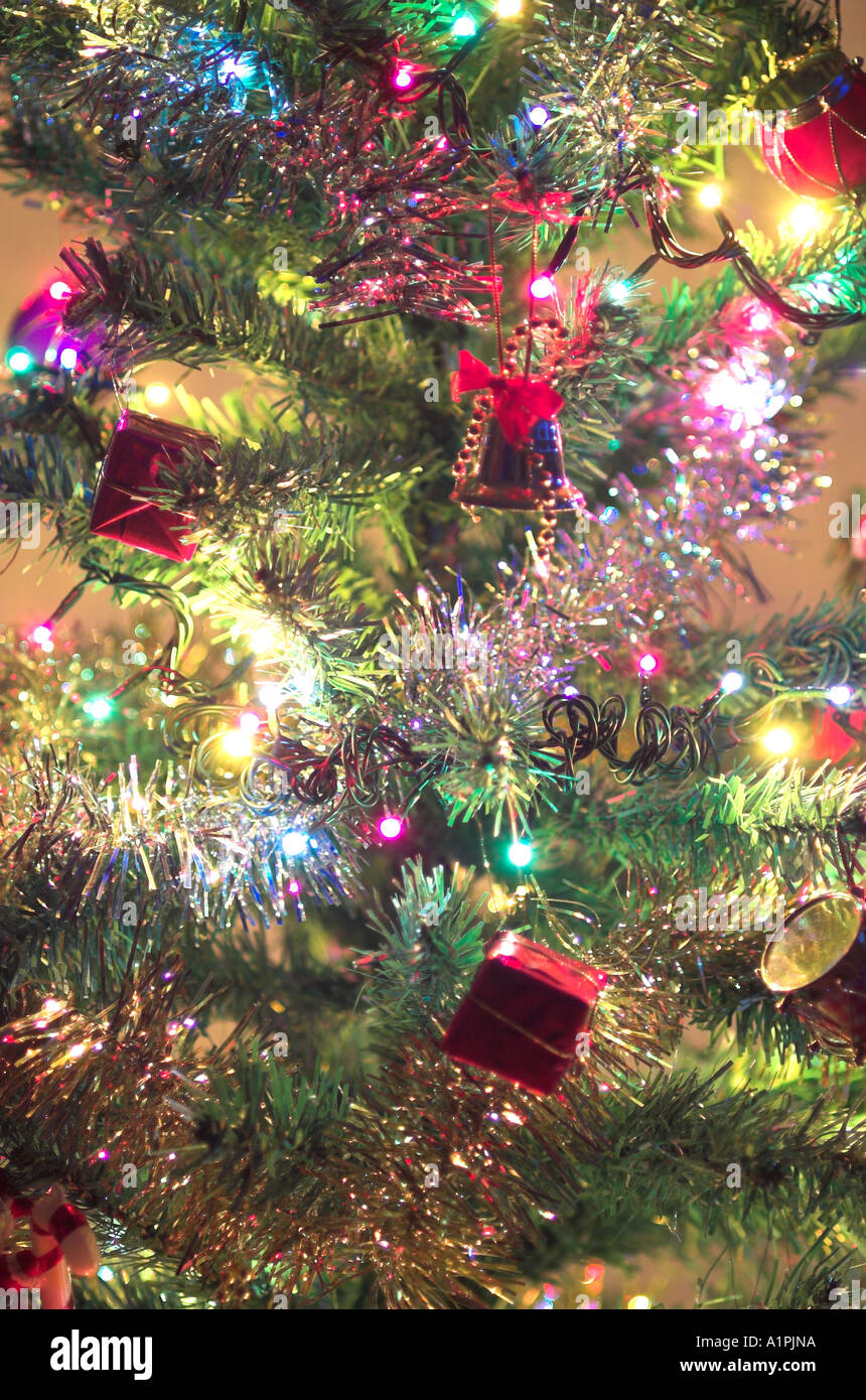 Christmas tree decorated and lit up Stock Photo - Alamy