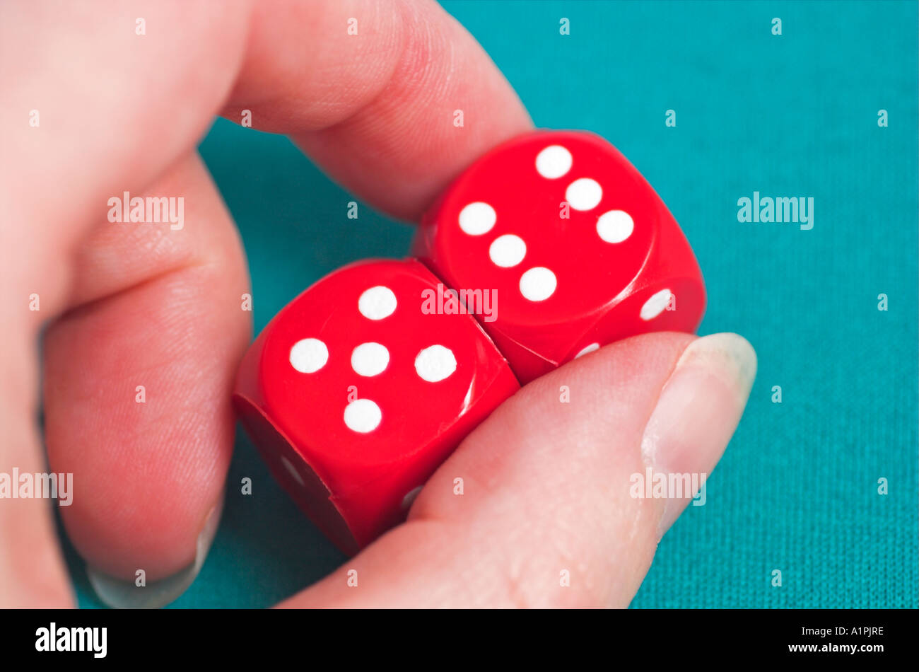 Human Hand Holding Dice Stock Photo - Alamy