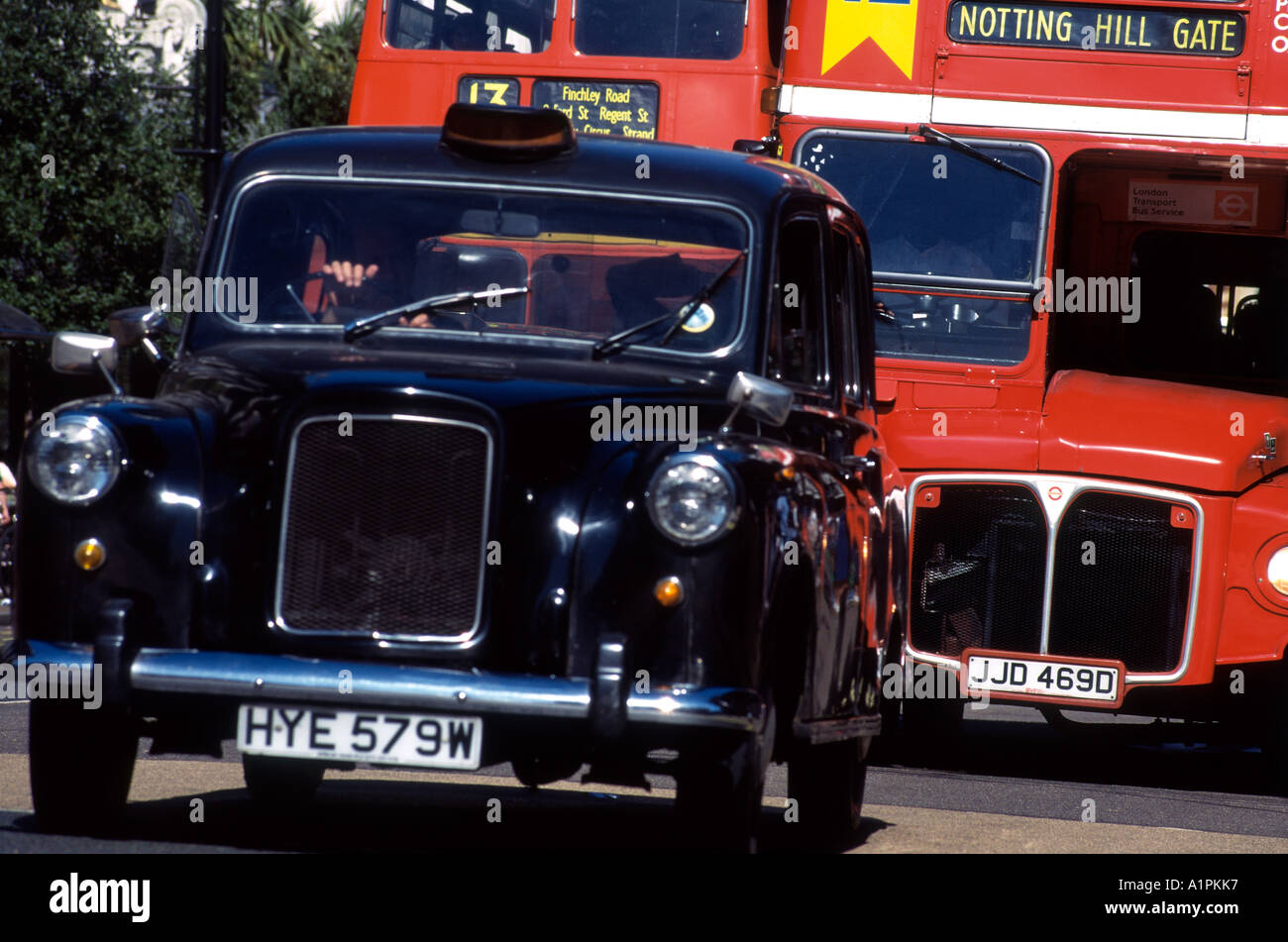 London Taxi Cab & Red Buses Stock Photo - Alamy