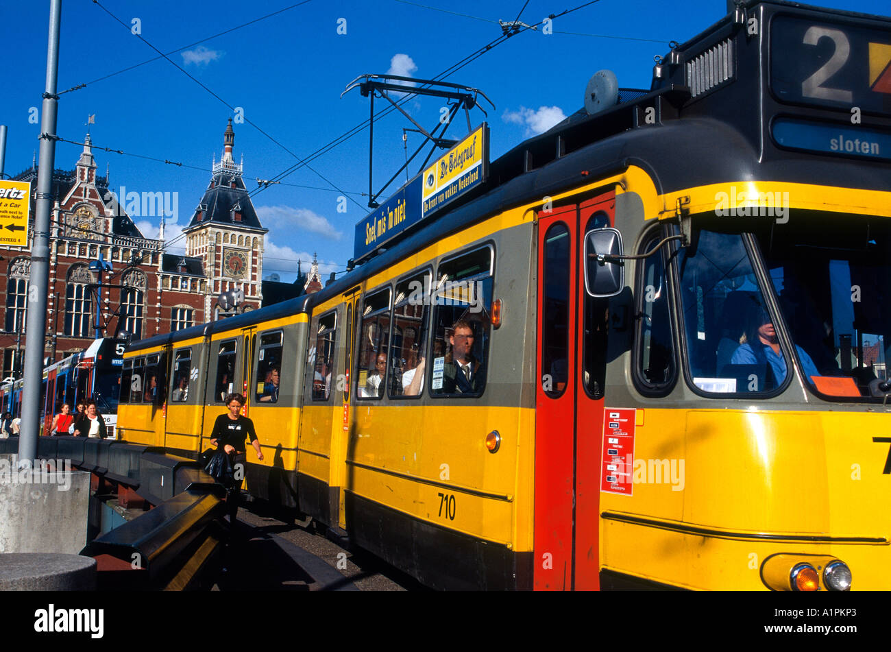 Amsterdam, Tram by Central Station Stock Photo - Alamy