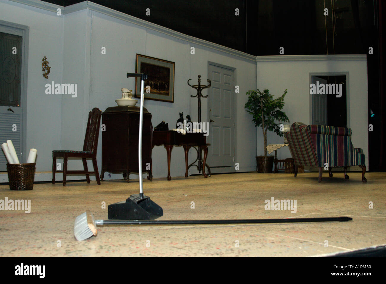 A broom and dustbin on stage Stock Photo - Alamy