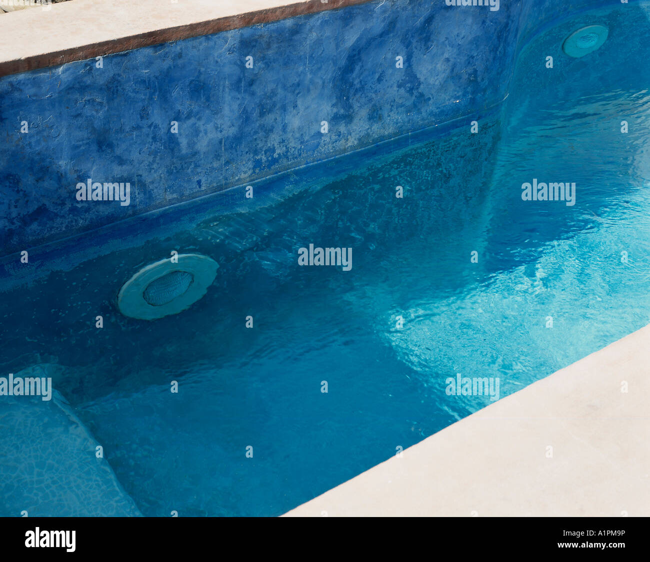 Partial view of a clear swimming pool Stock Photo - Alamy