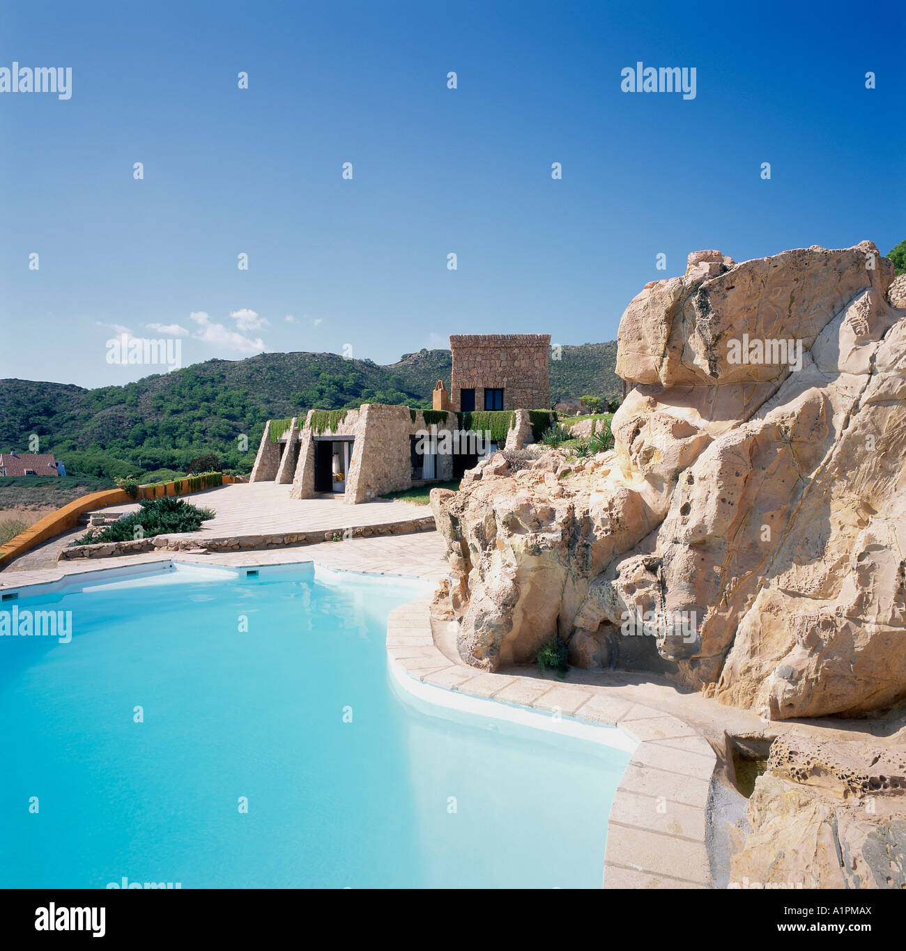 View of a swimming pool outside a vacation resort Stock Photo - Alamy