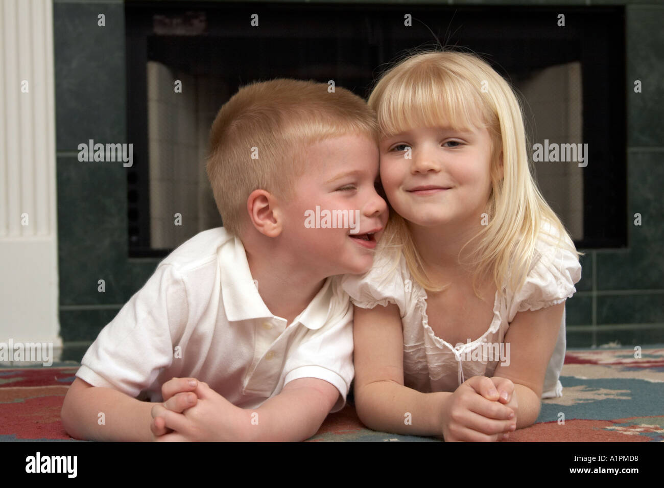 Small boy and girl playing together Stock Photo - Alamy