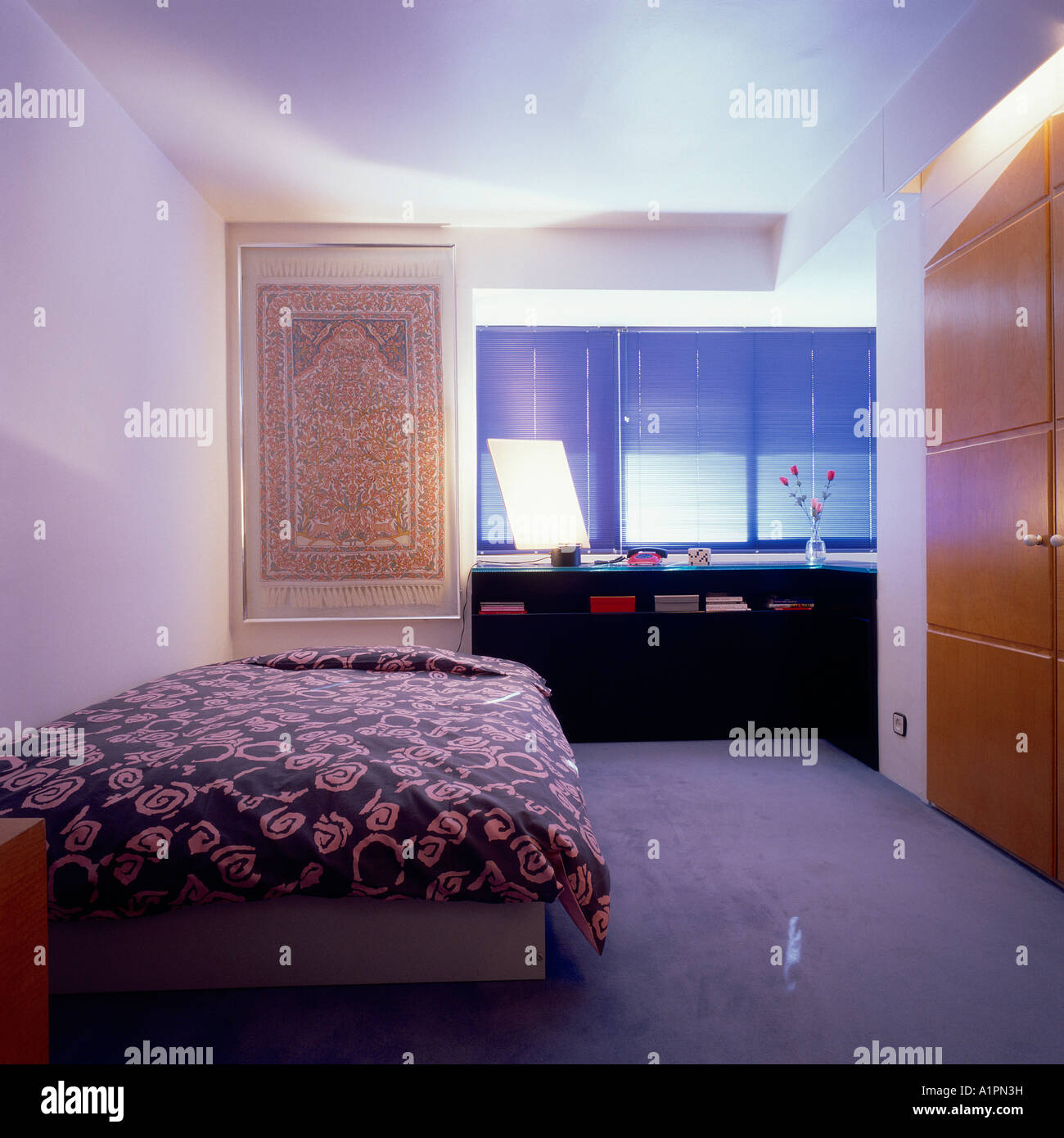 View of a neat bedroom Stock Photo - Alamy