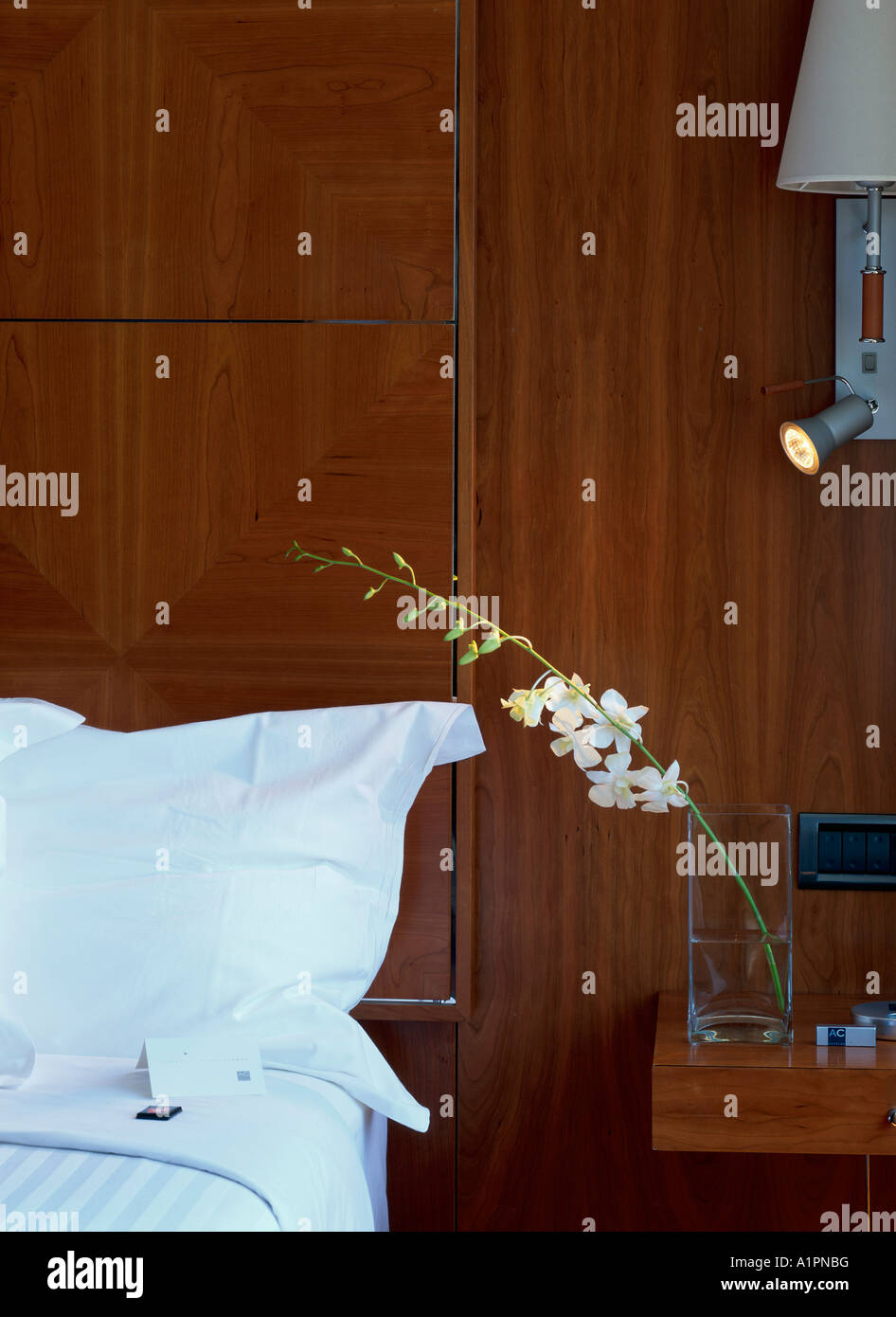 View of a flower vase placed on a nightstand Stock Photo - Alamy